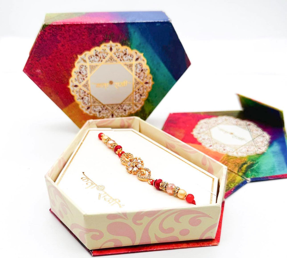 Beautiful stone studded Rakhi in beautiful box packing– Saheli Ethnic ...