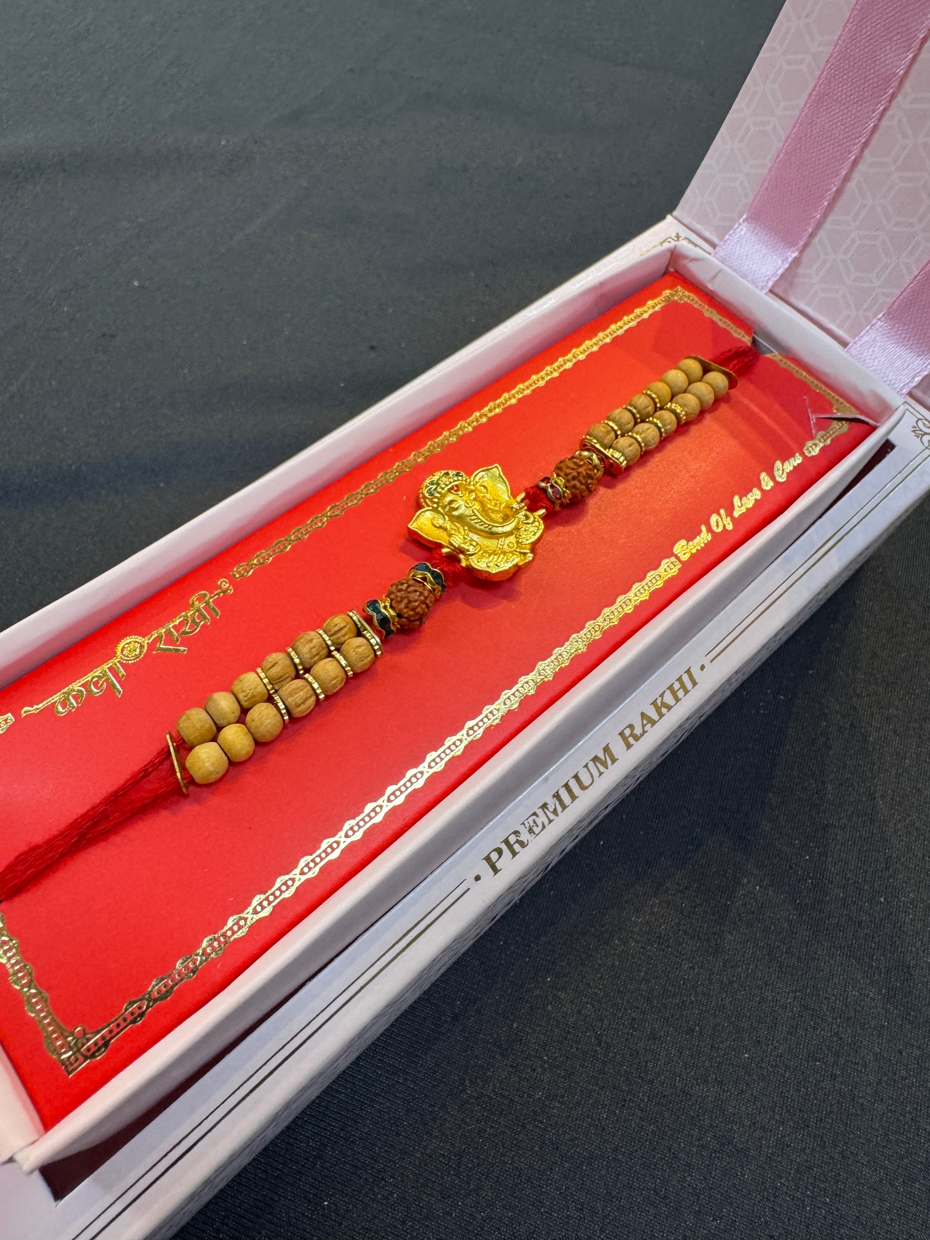 Ganesha design Beautiful Stone Work Rakhi in nice pack gift box– Saheli ...