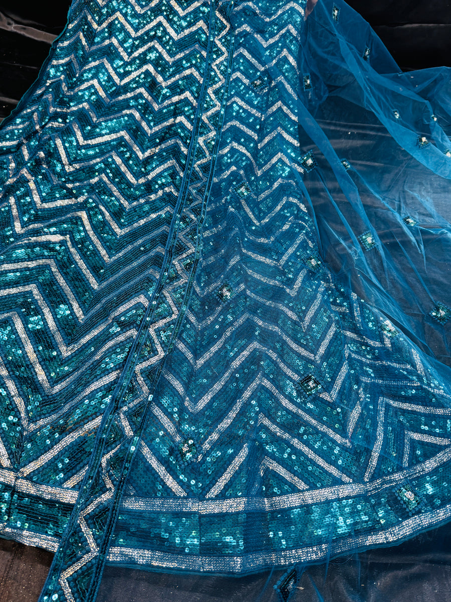 Peacock Blue color Netting based full of sequined work multiflared bea ...