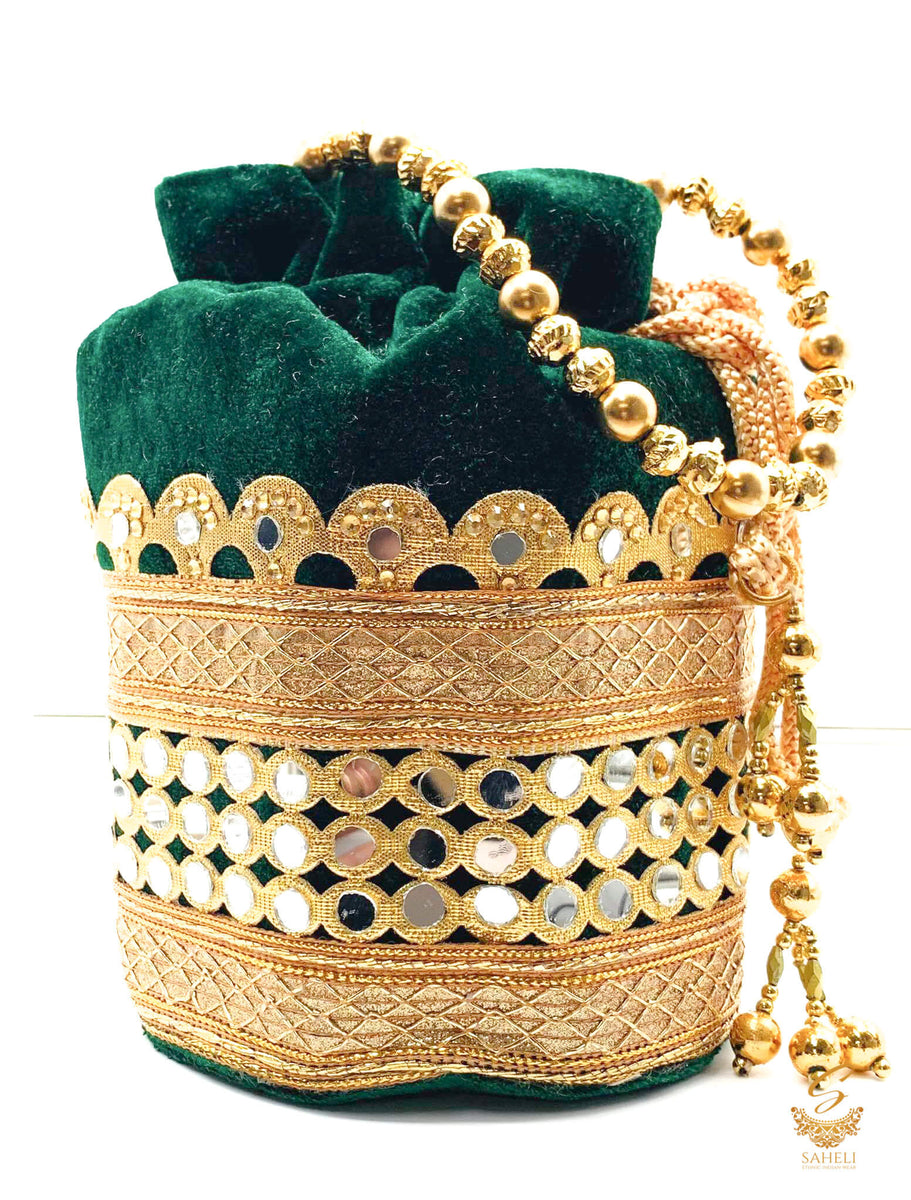 Deep KAi Green colour velvet based mirror work with pearl work handle ...